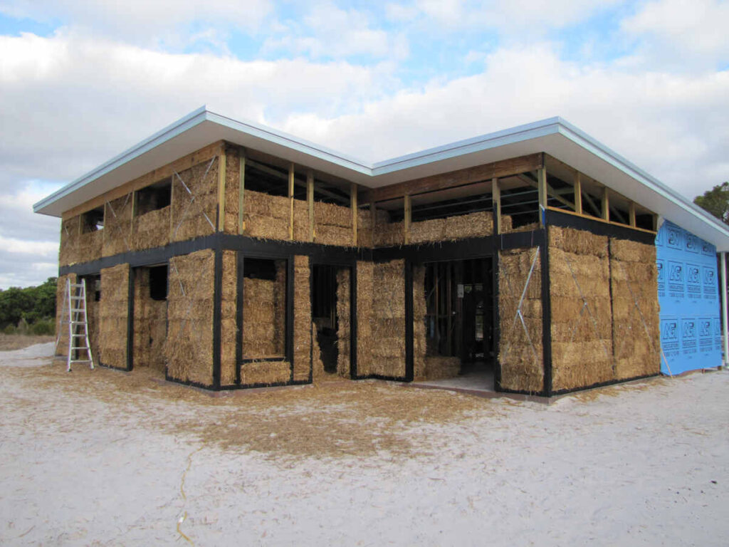 8 Benefits of Straw Bale Construction | Green Building Canada